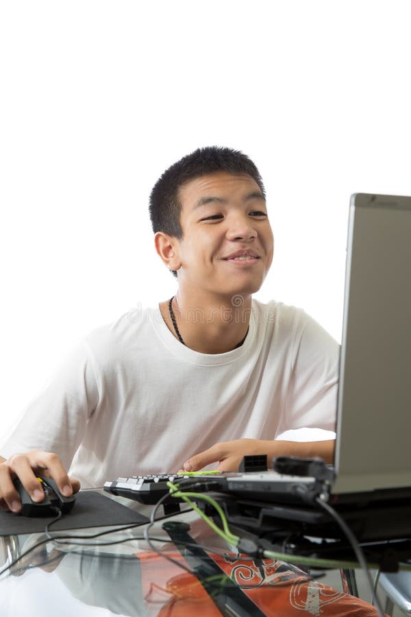 Asian Teenager Using Computer with Smily Face Stock Photo - Image of ...
