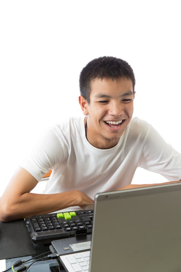 Asian Teenager Using Computer with Smily Face Stock Image - Image of ...