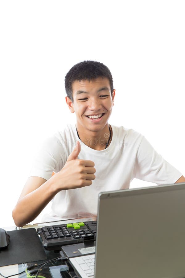 Asian Teenager Using Computer with Thumb Up (LIKE Gesture) Stock Image ...