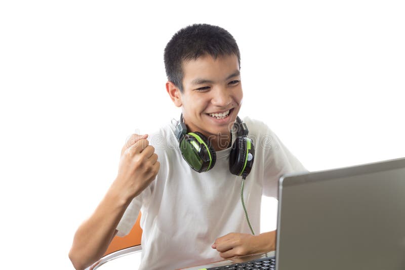 Asian Teenager Using Computer with Funny Face Stock Image - Image of ...