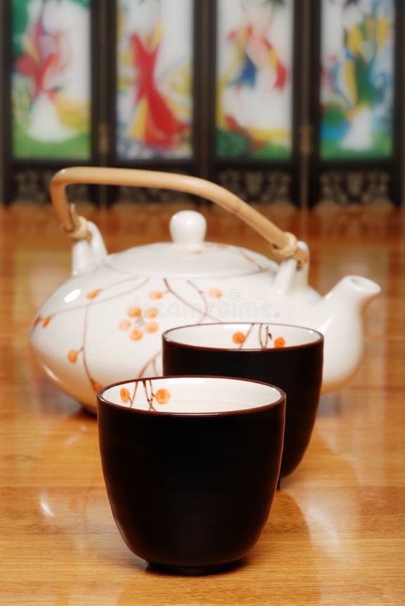 Asian two cups and tea pot stock image. Image of kettle - 12526023