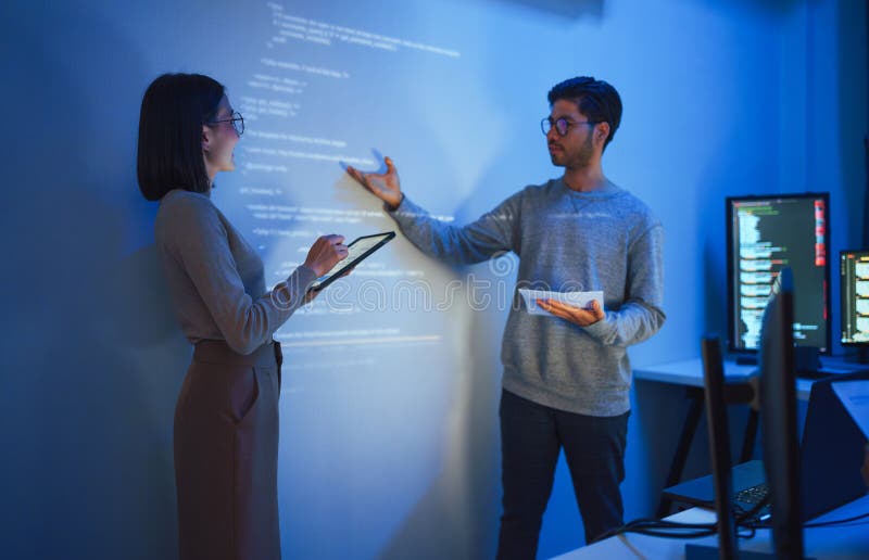 Asian Two Software Developers Presentation In Collaborative Coding