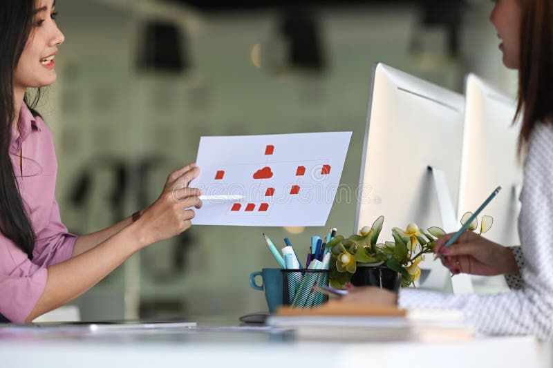 Asian Ux Developer and Ui Designer Presenting Mobile App Interface ...