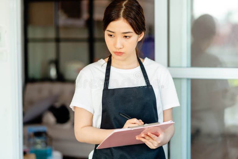 The Asian Waitress is Checking the Hotel Room after Guests Check Out ...