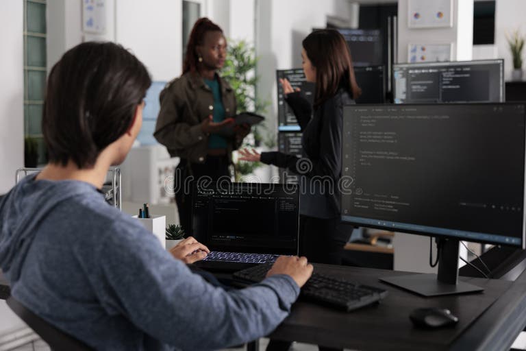 Asian Web Developer Analyzing Compiling Code Looking at Computer and Laptop Stock Photo - Image ...