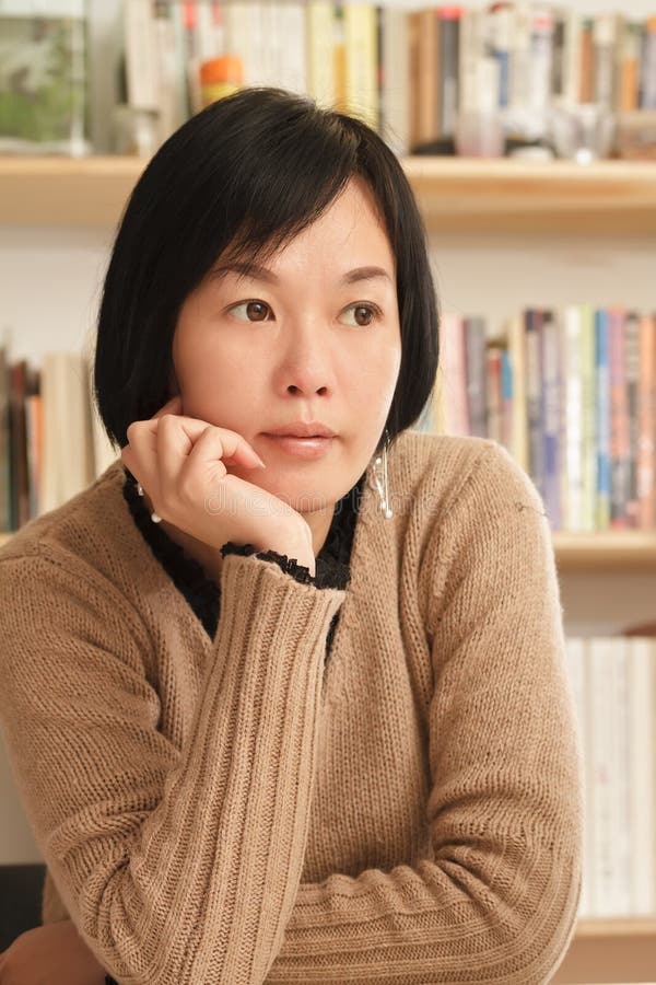 Asian woman thinking stock image. Image of woman, photograph - 12061709