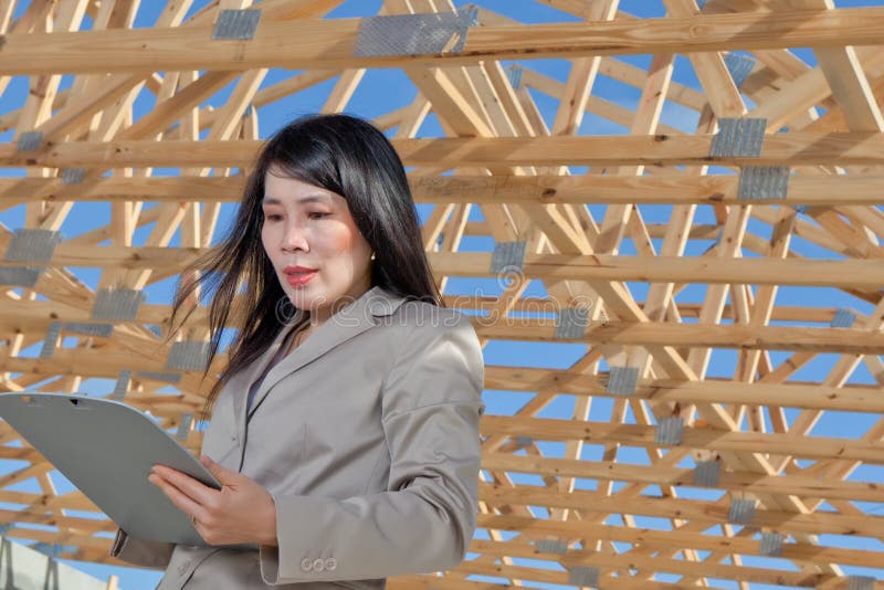 Asian Woman contractor stock image. Image of remodeling - 15201945