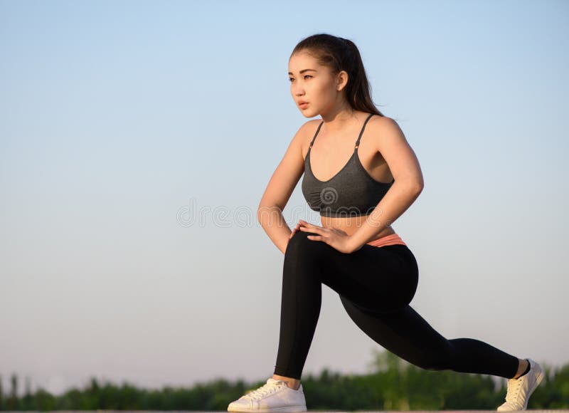 Asian Woman Doing Exercise at the Morning Outdoor Stock Image - Image ...