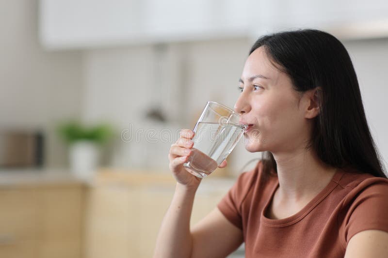 Asian Woman Drinking Water in the Kitchen Stock Photo - Image of ...