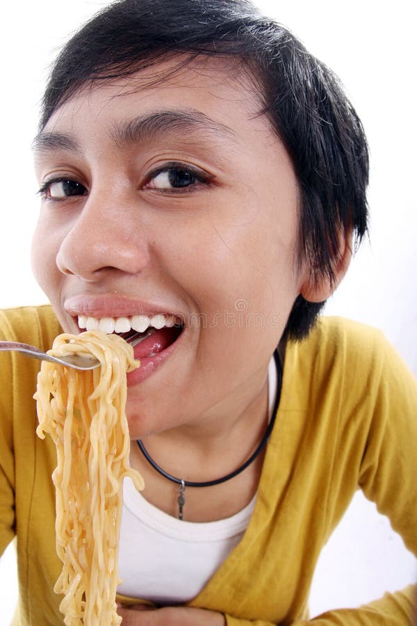Asian woman eating noodle stock photo. Image of studio - 15690562