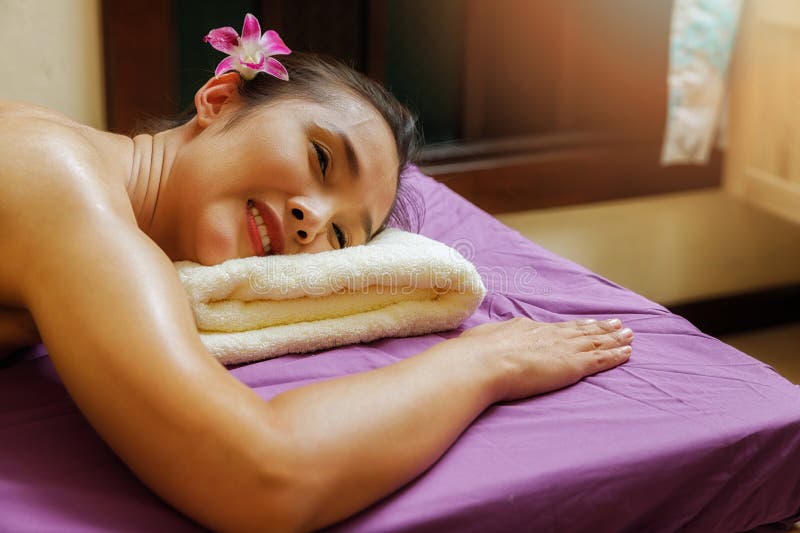 Asian Woman Enjoying Back Massage In Massage Salon Beauty Treatment Concept Stock Image Image