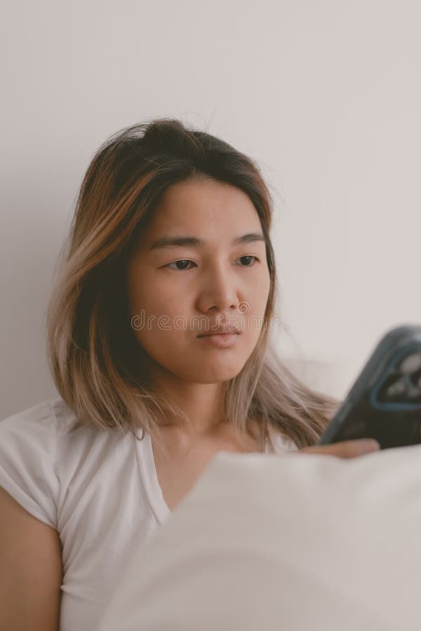 Asian Woman Feel Sad and Crying while Checking the Mobile Phone. Stock ... Asian Woman Feel Sad and Crying while Checking the Mobile Phone. Stock ...