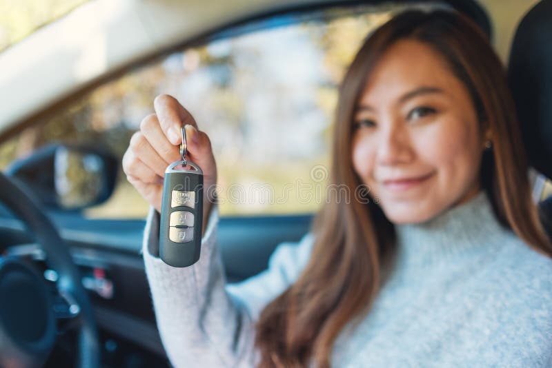 An Asian Woman Holding Car Key Stock Image - Image of girl, lease ...