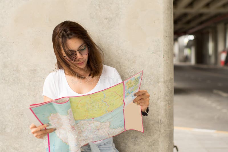 Asian Woman Holding a Map for Planning Travel Stock Image - Image of ...