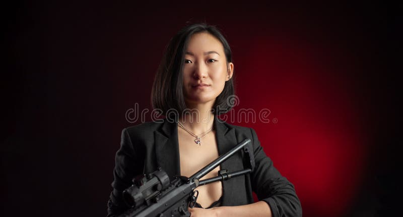 Asian Woman in a Jacket with an Automatic Rifle in Her Hands Mafia ...