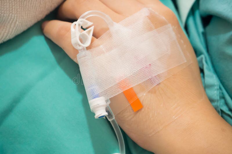 Asian Woman Patient Hand on IV Drip with Saline Solution, Fluid Stock ... Asian Woman Patient Hand on IV Drip with Saline Solution, Fluid Stock ...