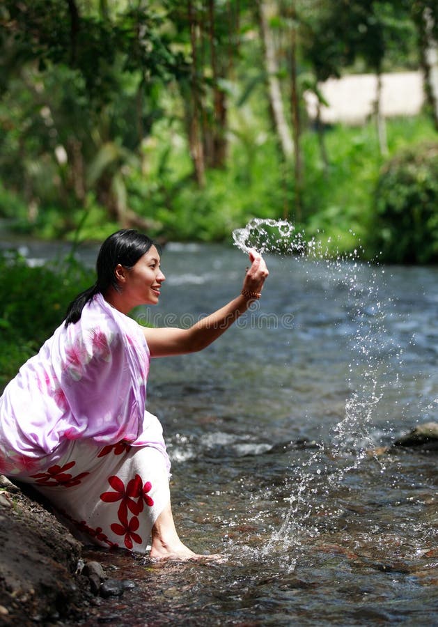 Asian Woman Playing with Water Stock Image - Image of hotel, pool: 411577