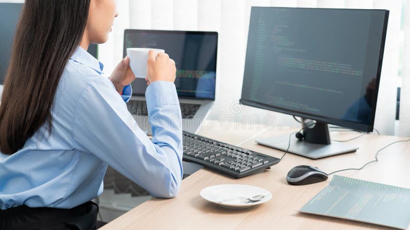 Asian Woman Programmer Typing Source Code With Computer Pc For Developing Program Or Application