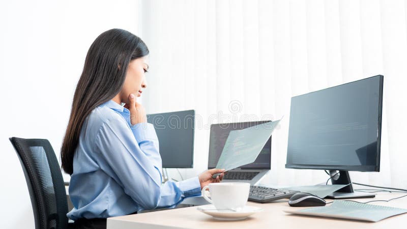 Asian Woman Programmer Typing Source Code With Computer Pc For Developing Program Or Application