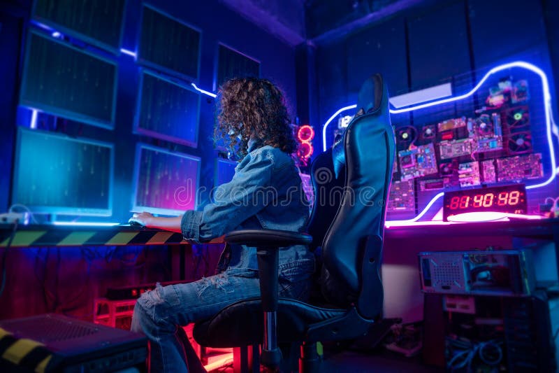 Asian Woman Programmer is Working in Her Computer Room , Futuristic ...
