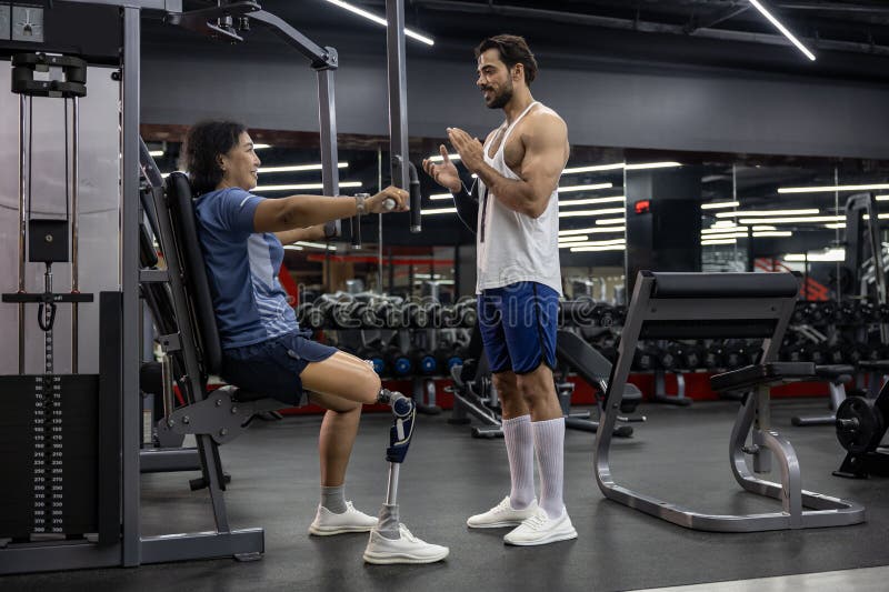 Asian Woman with Prosthetic Leg from Amputation from Doing Weight ...