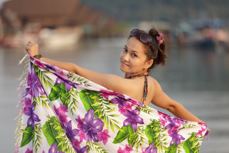 Asian woman with sarong stock image. Image of adult, outside - 19382387