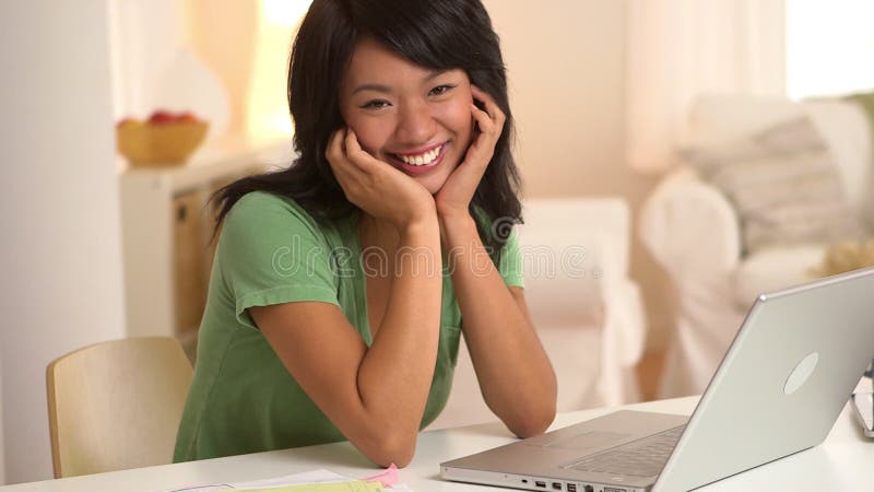 Asian Woman Smiling while Using Laptop Computer Stock Footage - Video ...