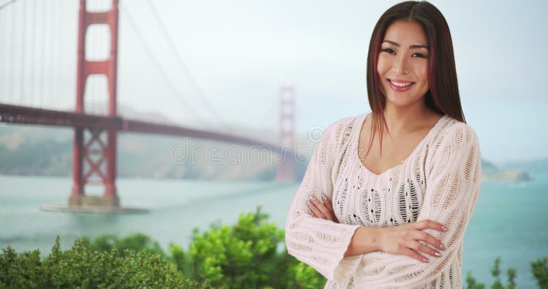 Asian Woman Standing by Golden Gate Bridge Stock Video - Video of ...