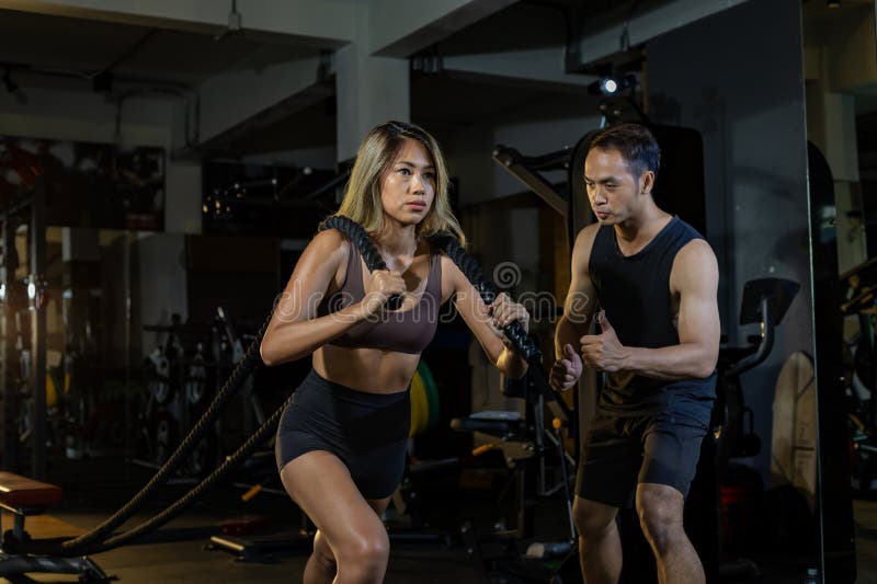 Asian Woman with Strong and Muscular Body Training on Core Weight ...