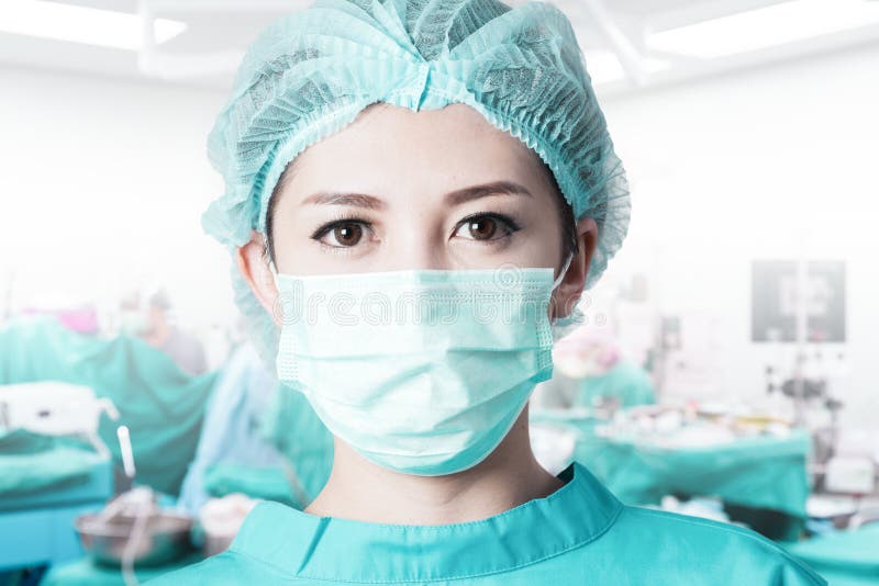 Asian Woman Surgeon in Operation Room Stock Photo - Image of healthcare ...