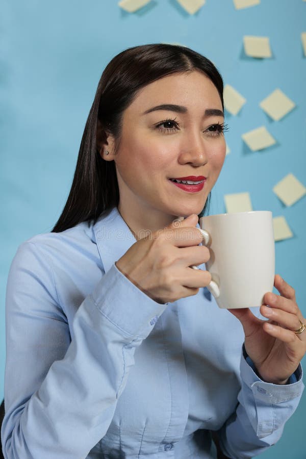 Asian Woman Taking a Break Drinking Coffee at Work Stock Photo - Image ... Asian Woman Taking a Break Drinking Coffee at Work Stock Photo - Image ...