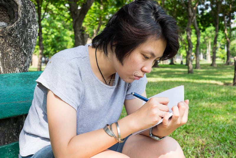 Asian Woman Taking Note with Pen and Book Stock Photo - Image of empty ...