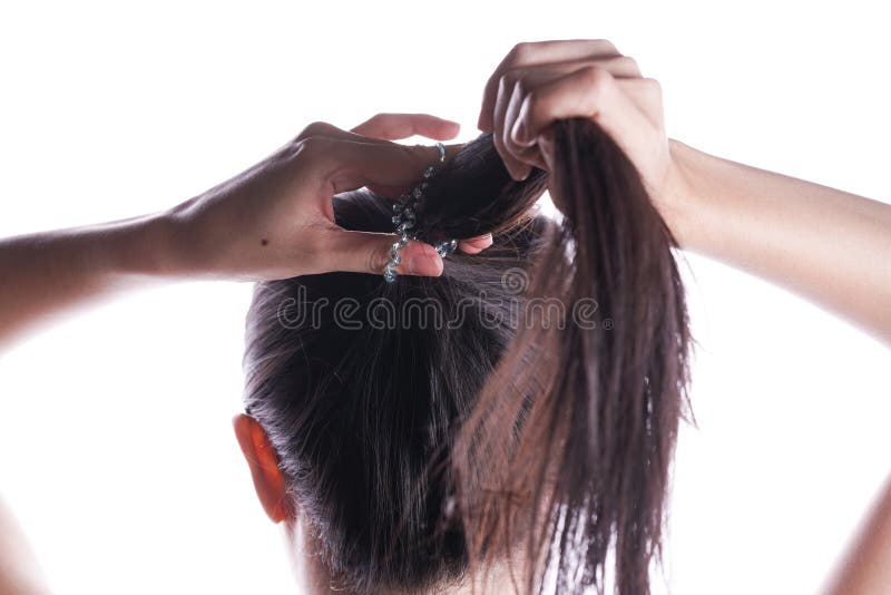 Asian woman tying her hair stock image. Image of taiwanese - 123303615