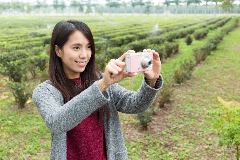 Asian Woman use of camera stock image. Image of gorgeous - 65752485