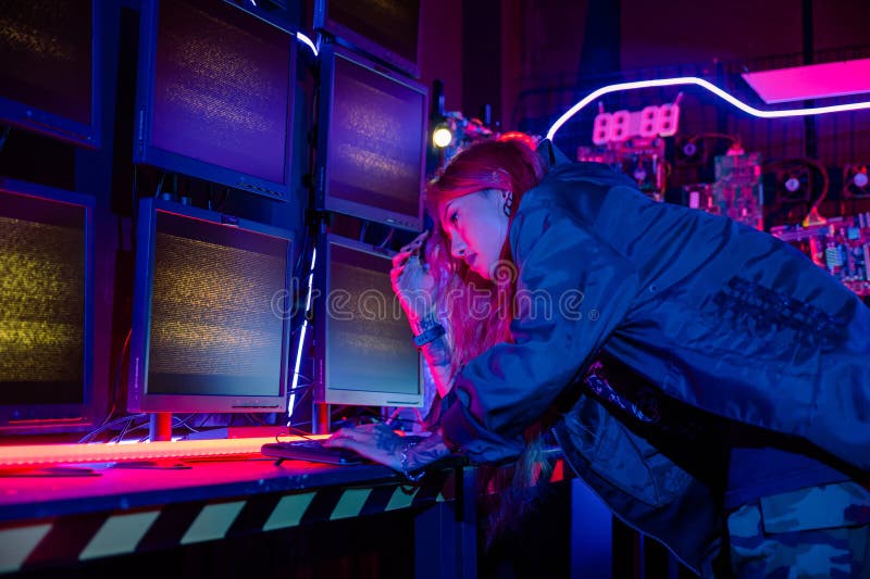 Asian Woman Wearing a Black Jacket Hacking Programming System and ...