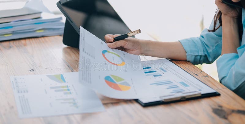 Asian Woman Working at the Office. Woman Using Laptop Computer on Desk ...