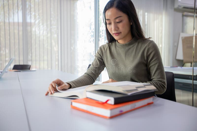 Asian Women Students Smile and Reading Book at Library Stock Photo ...
