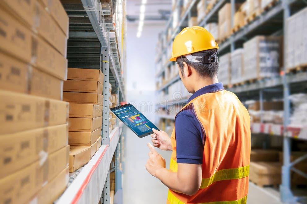 Asian Worker or Engineer in Warehouse with Cardboard Boxes Stock Image ...