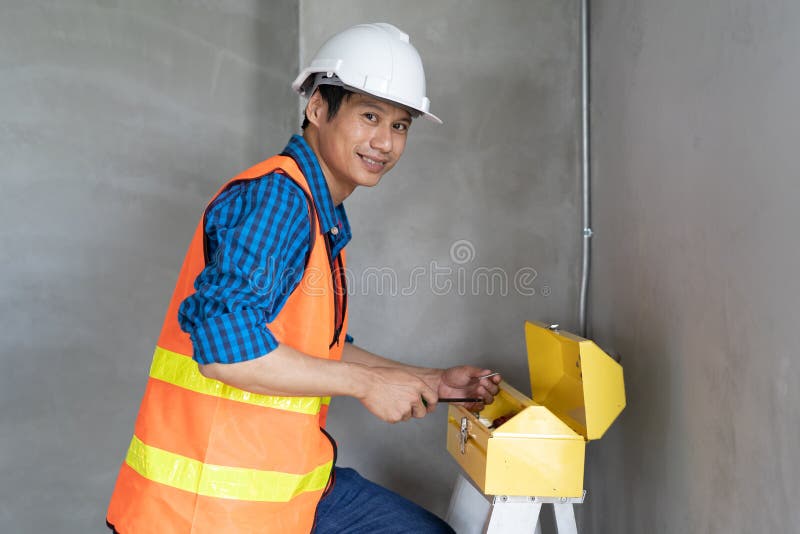 Asian Worker Opening Tool Boxes in Construction Site Stock Photo ...