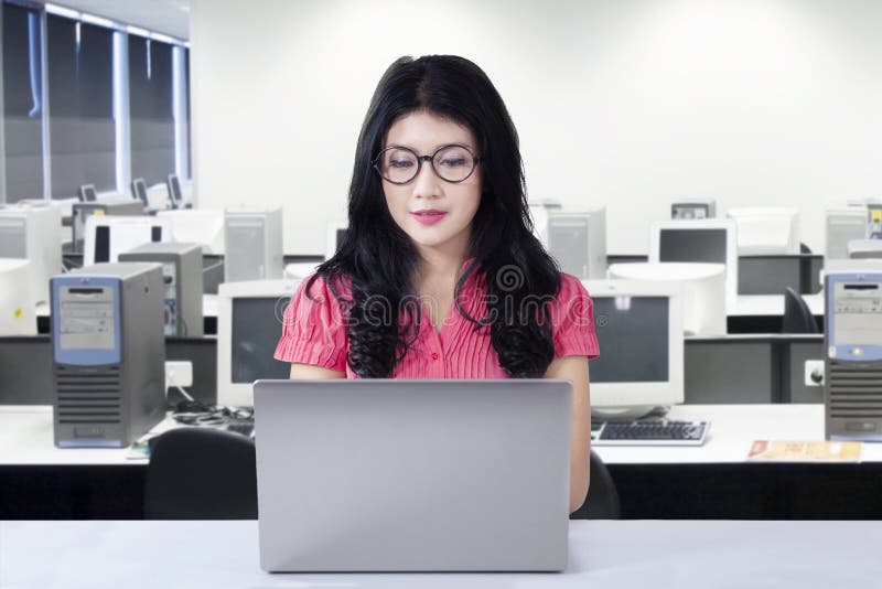 Asian Worker Using Notebook in Office Stock Image - Image of business ...