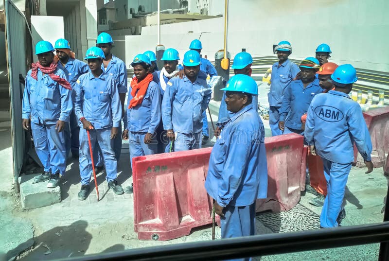 Asian Workers in Dubai. a Group of Asian Workers at the Construction ...