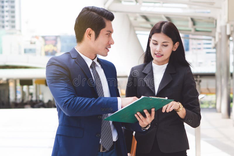 Asian Young Employee / Staff Asking for Advice from Manager / Boss ...