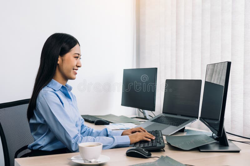 Asian Young Female Programmer Working Developer Programing on a ... Asian Young Female Programmer Working Developer Programing on a ...