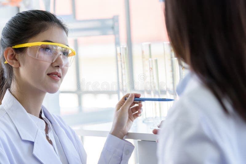 Asian Young Female Working and Research Scientist Together Stock Photo ...