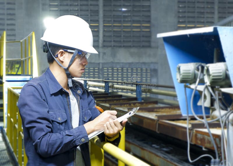 Asian Young Men Check the Machine Inside the Industrial Factory Stock ...