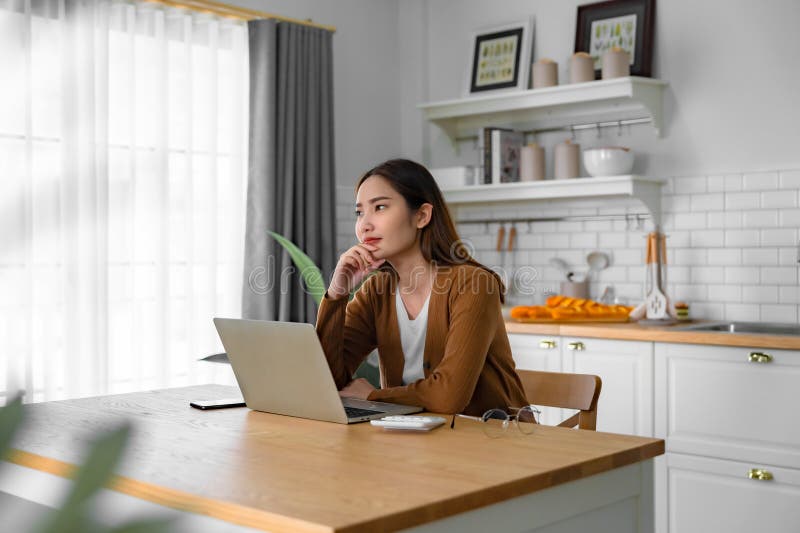 Asian Young Woman Seriously Working on Computer Laptop in House Stock ...
