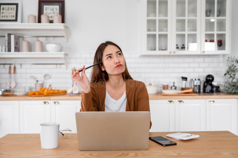 Young Asian Woman Using Computer Laptop at Home. Female Showing Gift ...
