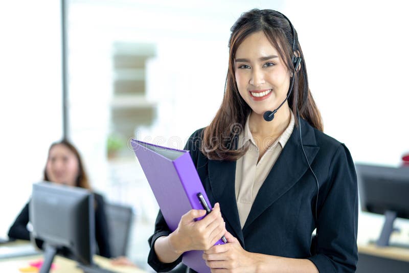 Asian Young Woman Working in Call Centre. Young Friendly Operator Woman ...