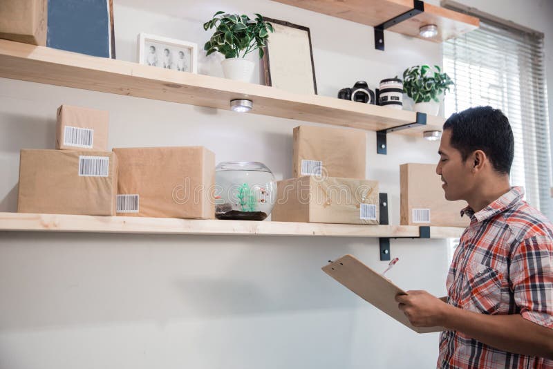 Male Shopkeeper Working In A Grocery Store Stock Image - Image of ...