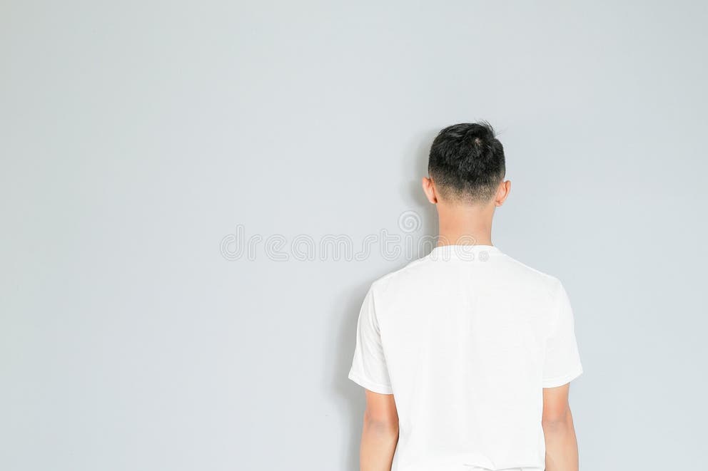 An Asian Youth is Facing Backwards Stock Photo - Image of emotion ...
